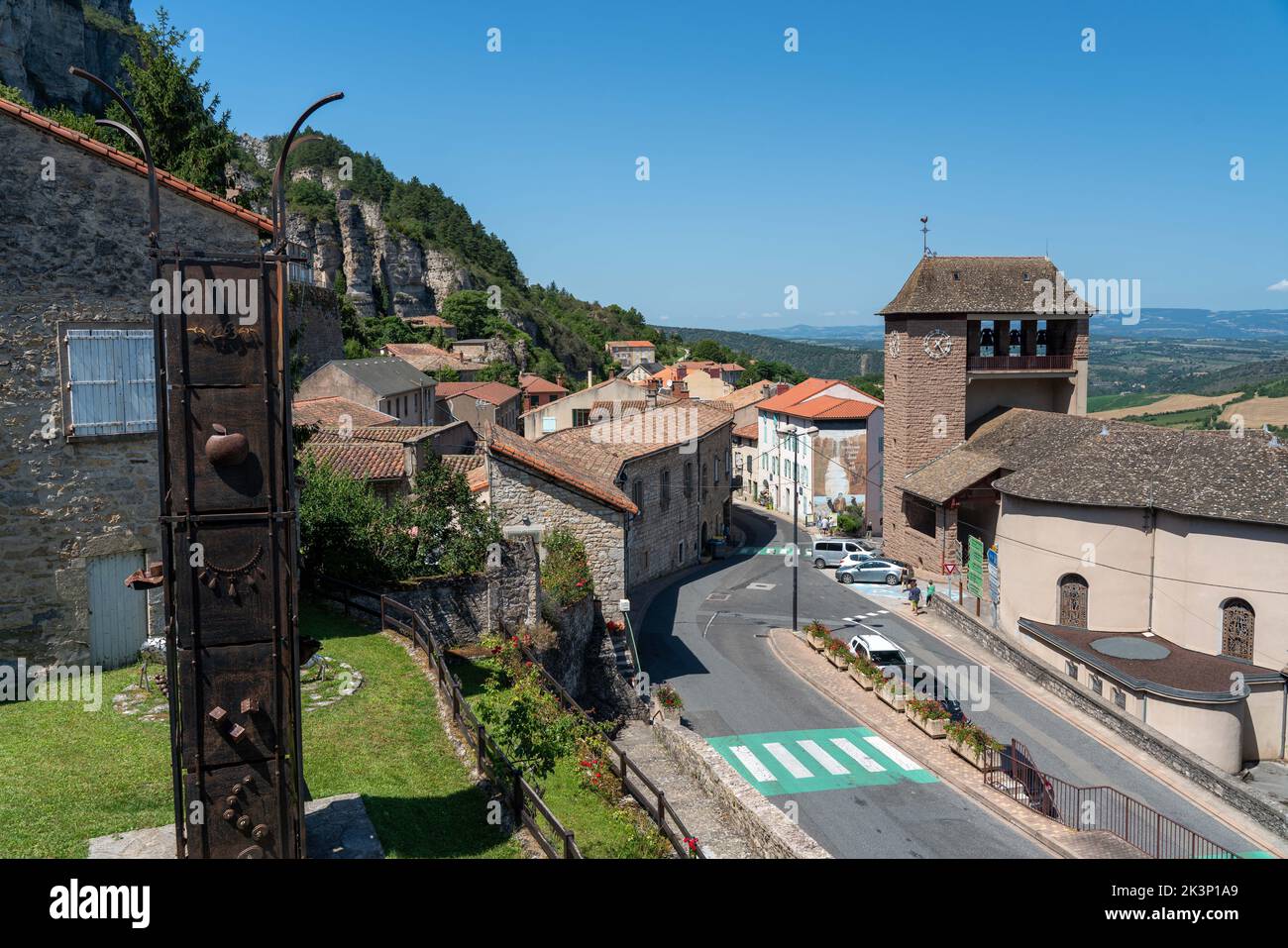 An aerial view of a road surrounded by houses in Roquefort-sur-Soulzon ...