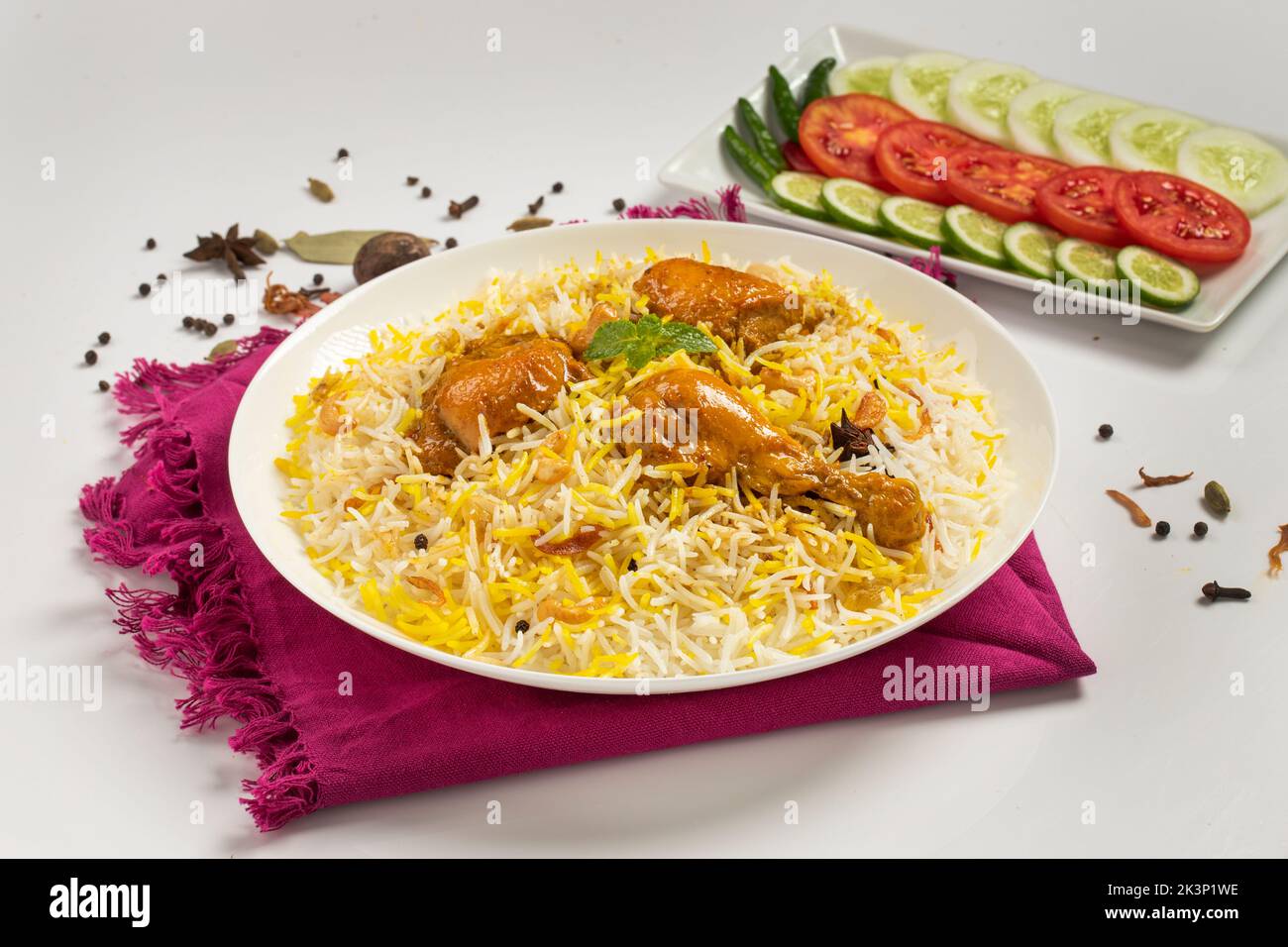 Dhum biriyani using jeera rice and spices arranged in earthen ware with ...