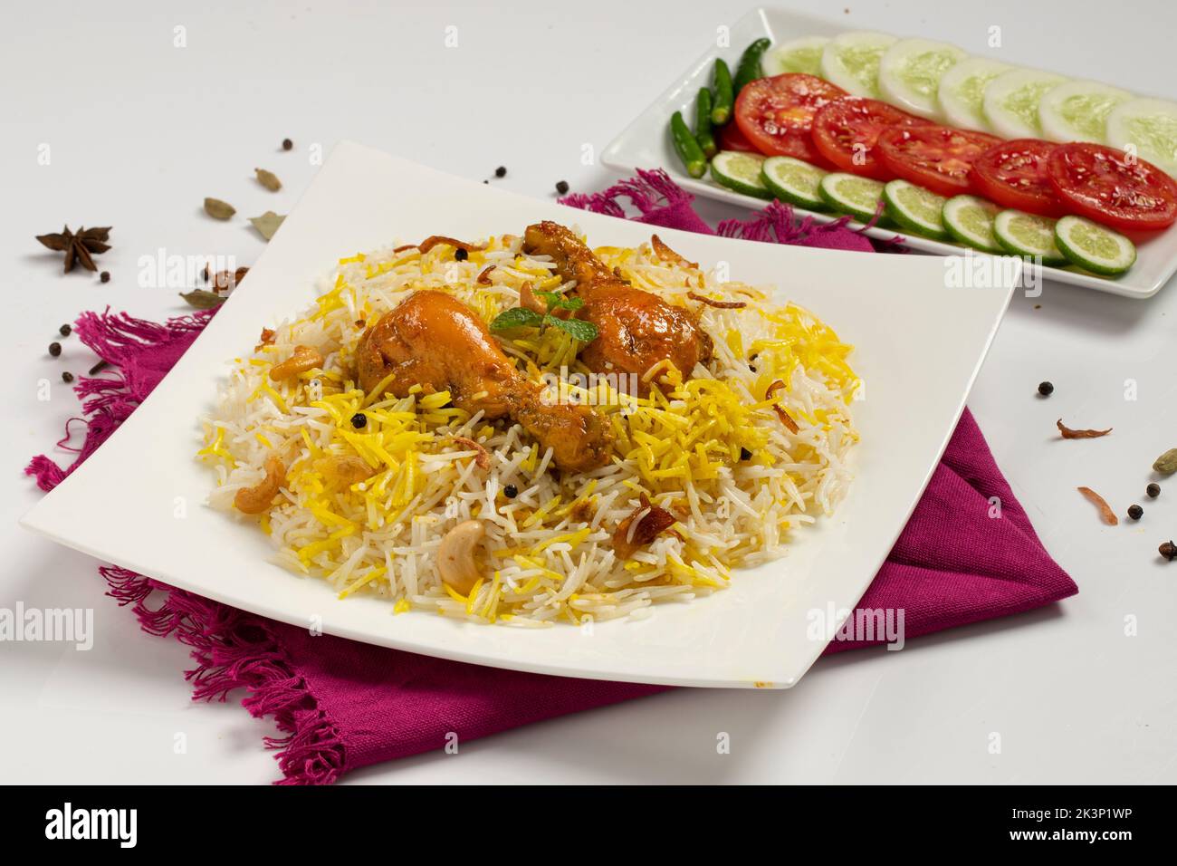 Dhum biriyani using jeera rice and spices arranged in earthen ware with ...