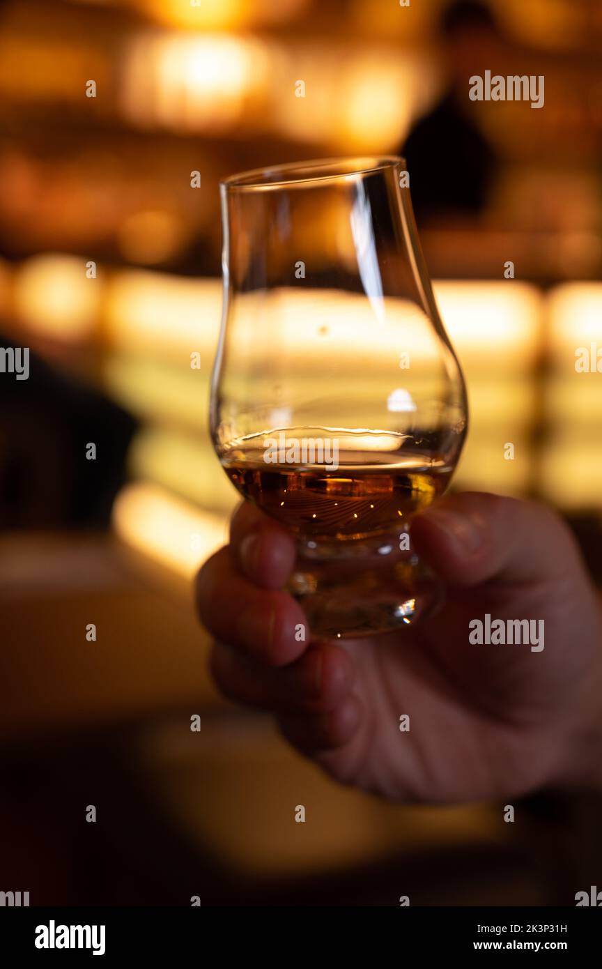 Tasting of single malt scotch whisky in scottish bar in Edinburgh, UK ...