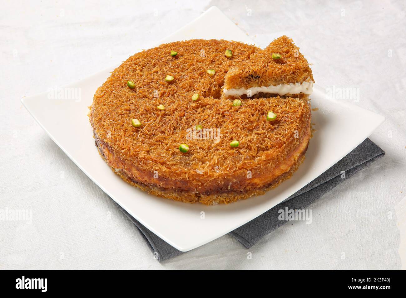 Delicious Arabic Sweet Kunafa sweets isolated on white background Stock ...