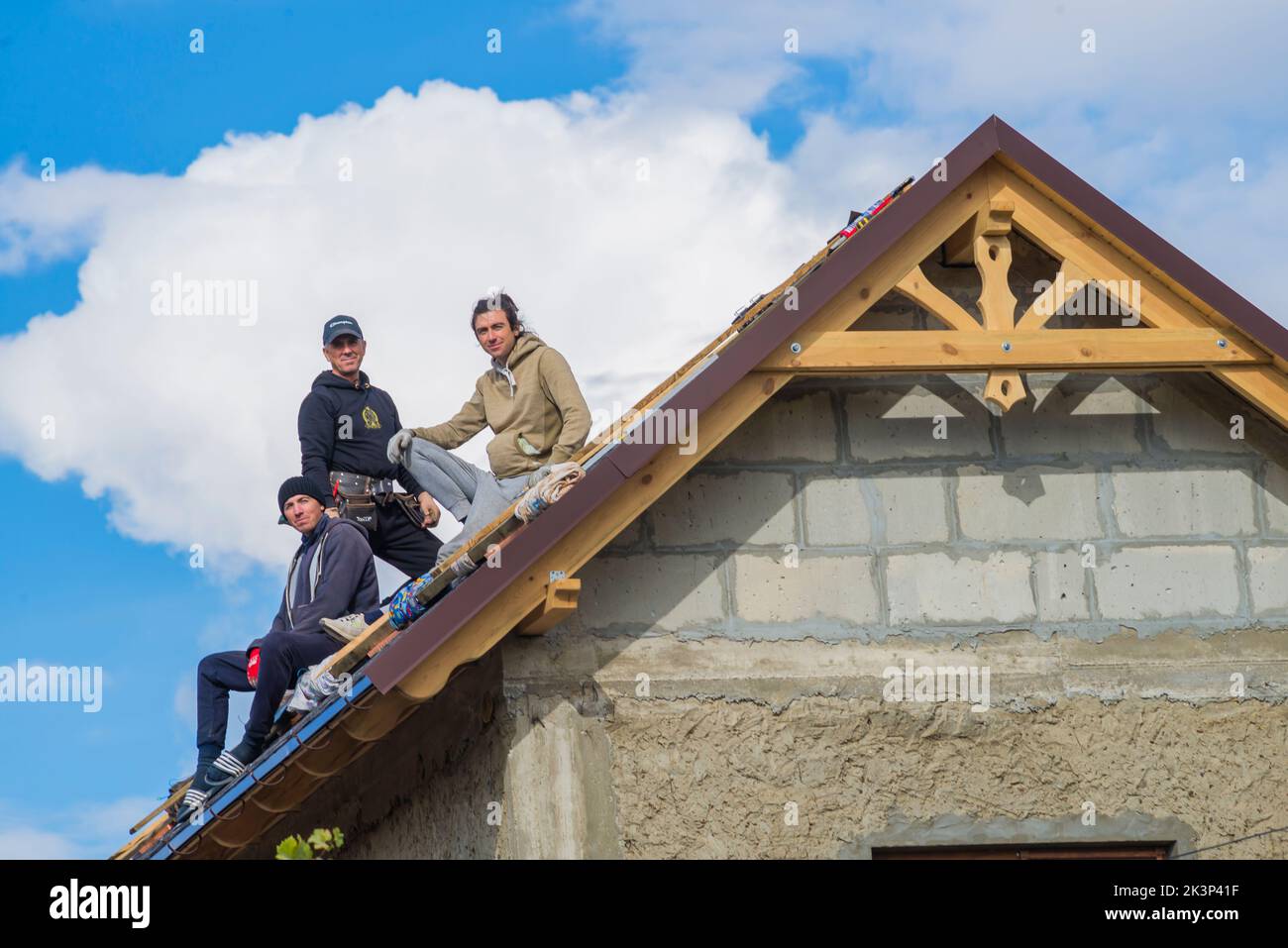 three Roofer man roof carpenter working Country house renovation ...