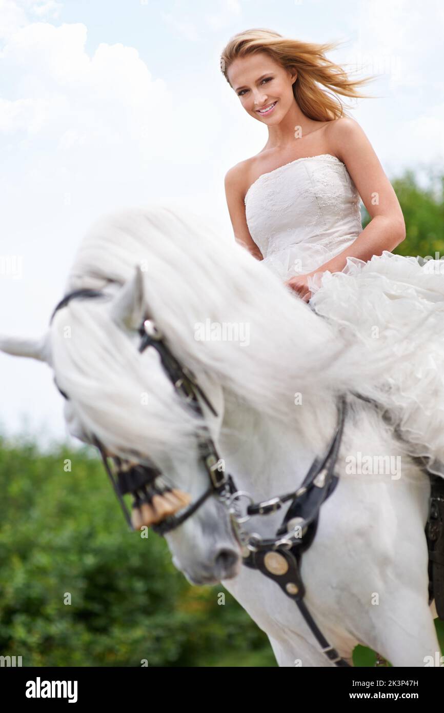 Stunning atop her steed - Wedding Day. A gorgeous bride posing for ...