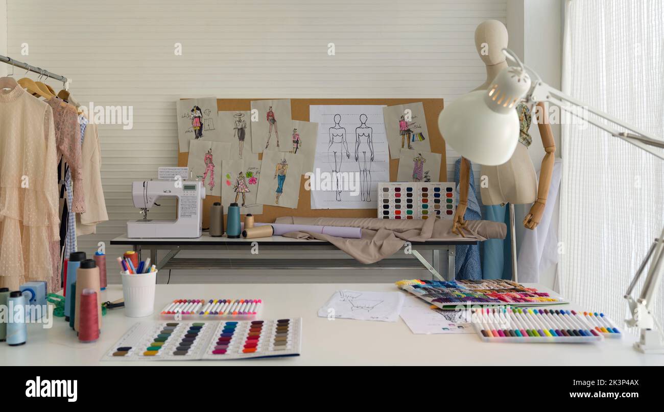 Fashion designer room. Sewing Machine and various sewing related items ...