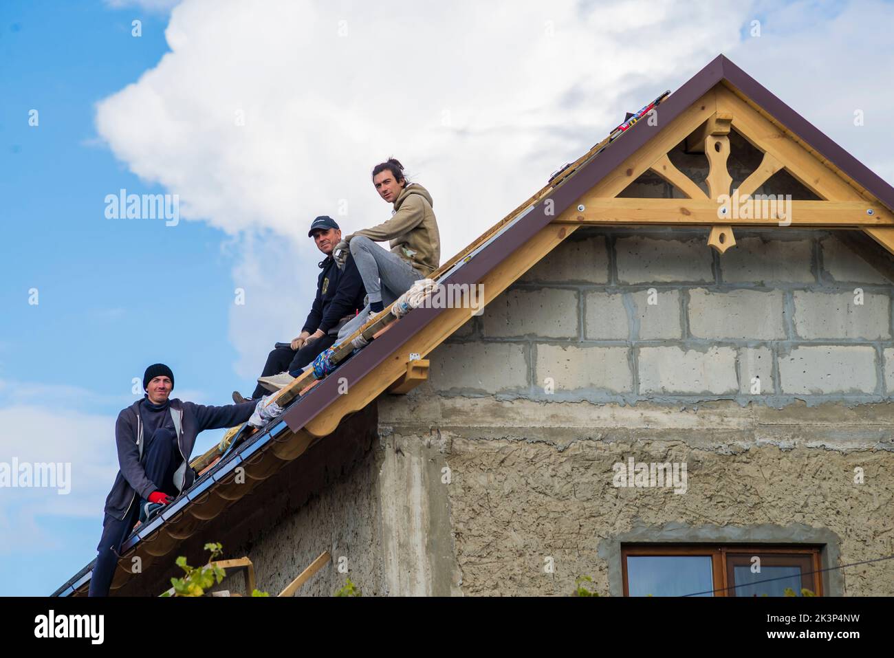three Roofer man roof carpenter working Country house renovation ...