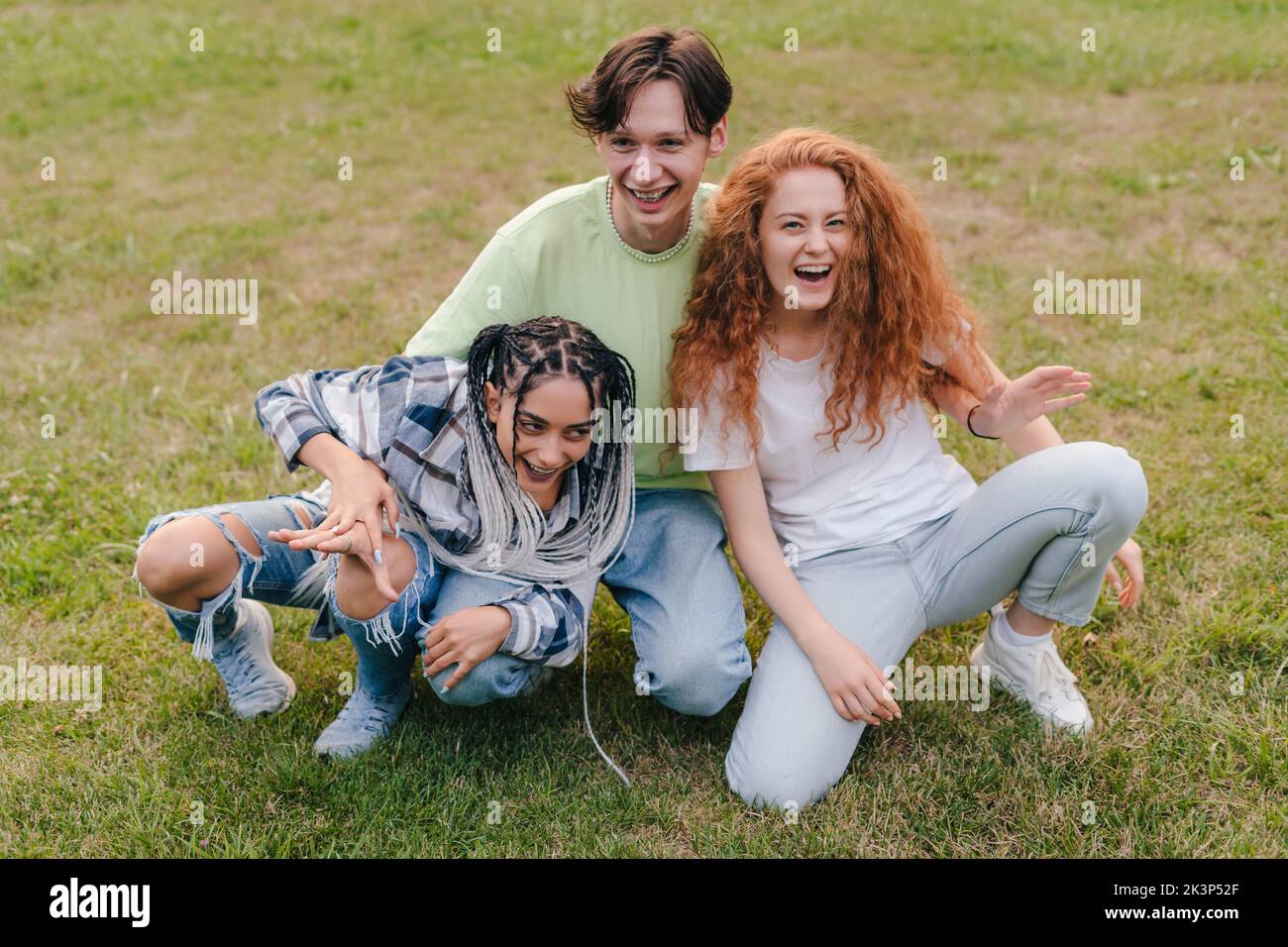 Happy group of friends having fun, sharing time together on college ...