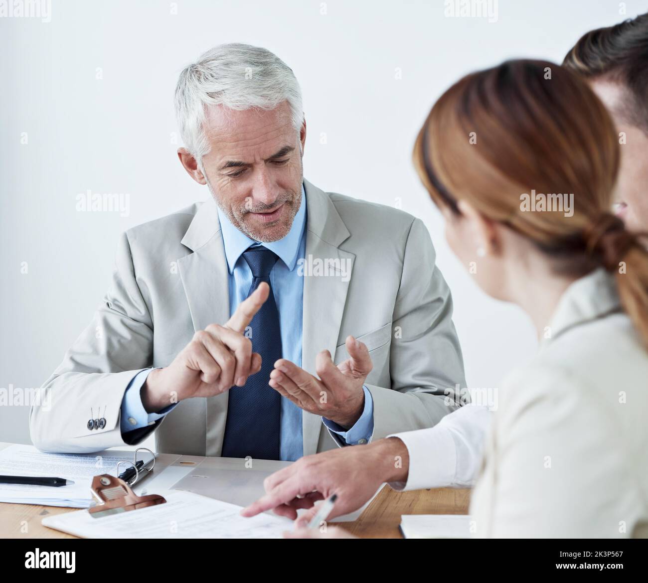 Going over important points. a group of colleagues having a meeting in ...
