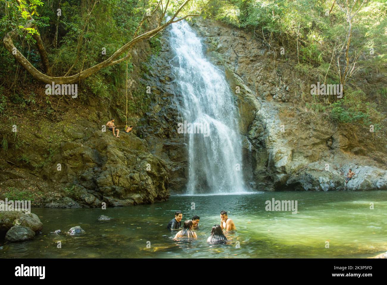 Enjoying the cascades at Montezuma Waterfall, Puntarenas, Costa Rica ...