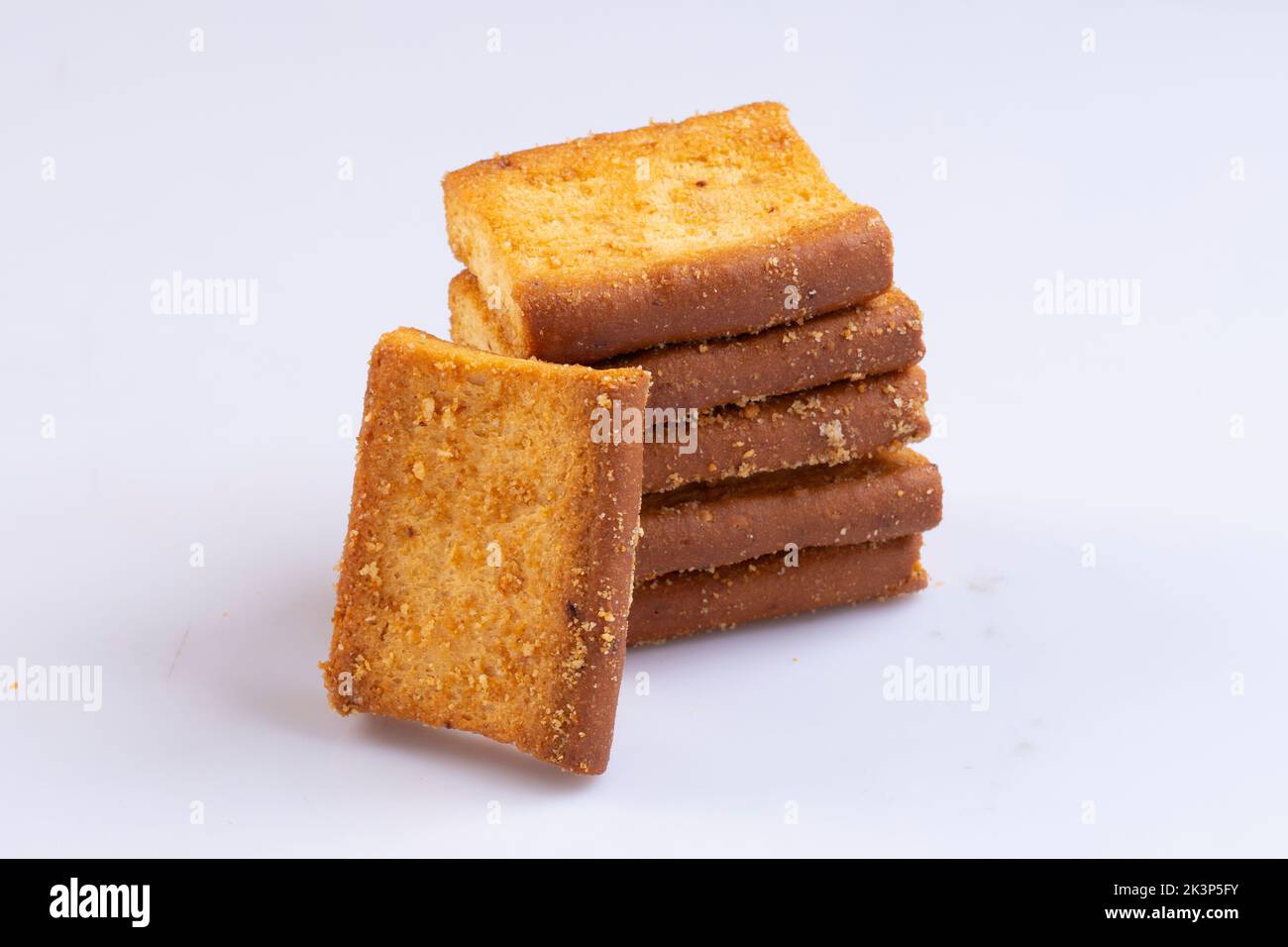 Crunchy Rusk or Toast for healthy life. Rusks creating a domino effect ...