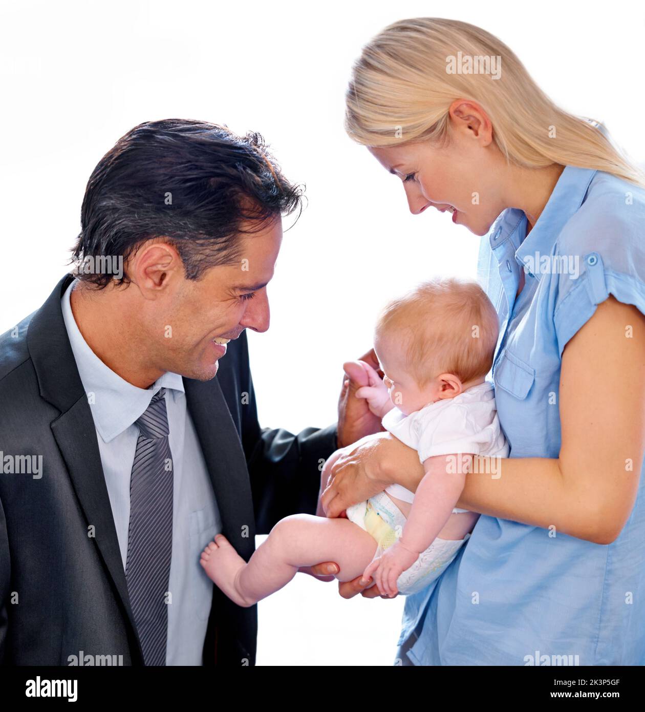 We love her so very much. Young mother and father doting over their ...