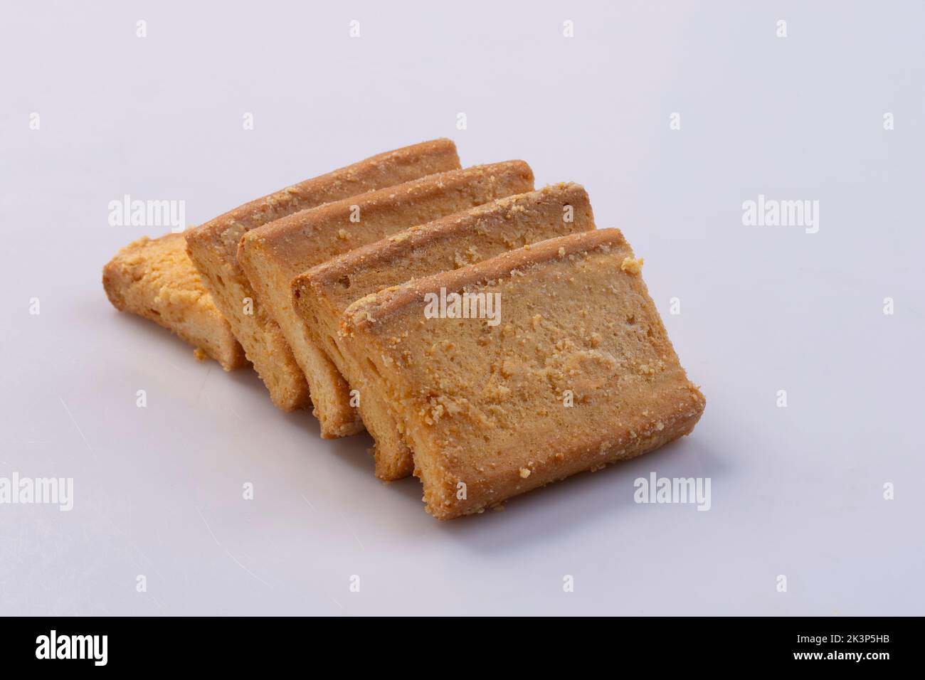 Crunchy Rusk or Toast for healthy life. Rusks creating a domino effect ...