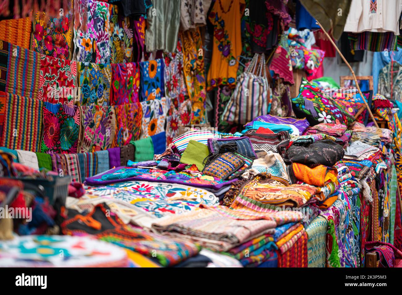 A beautiful traditional bright clothes in an outside market Stock Photo ...