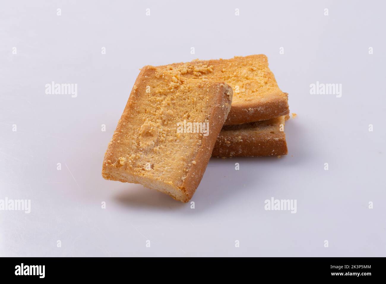 Crunchy Rusk or Toast for healthy life. Rusks creating a domino effect ...