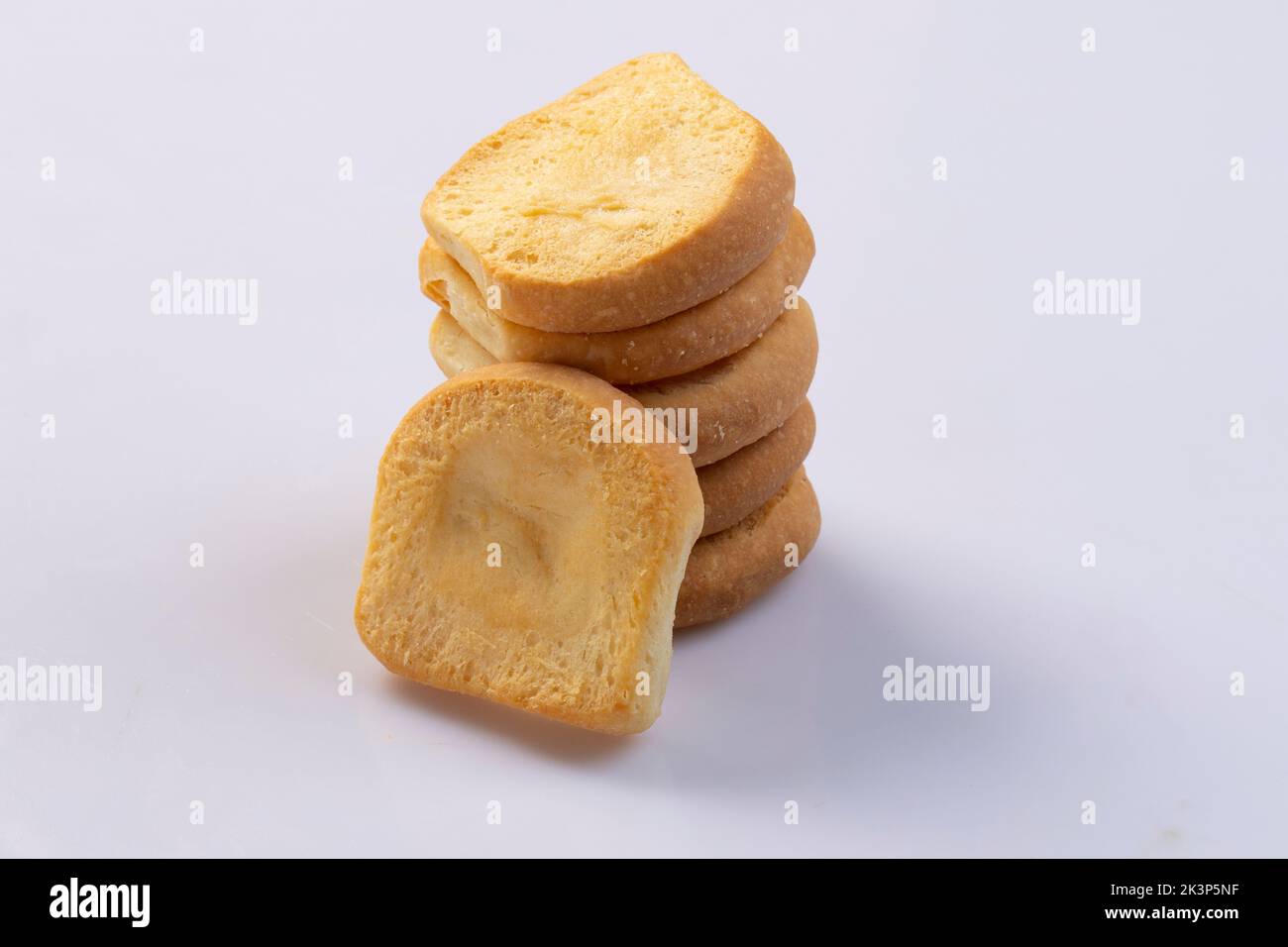 Crunchy Rusk or Toast for healthy life. Rusks creating a domino effect ...
