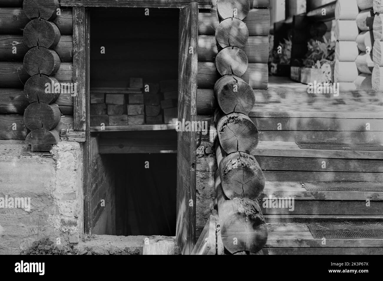 an open door to a creepy basement, in black and white Stock Photo - Alamy