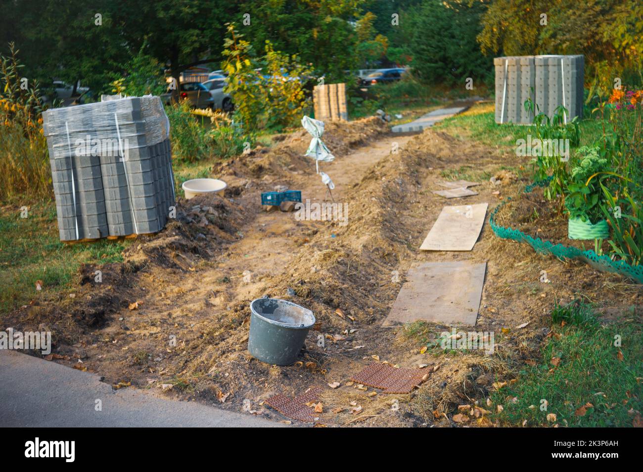 a messy street and new tile path arrangement, urban scene Stock Photo ...