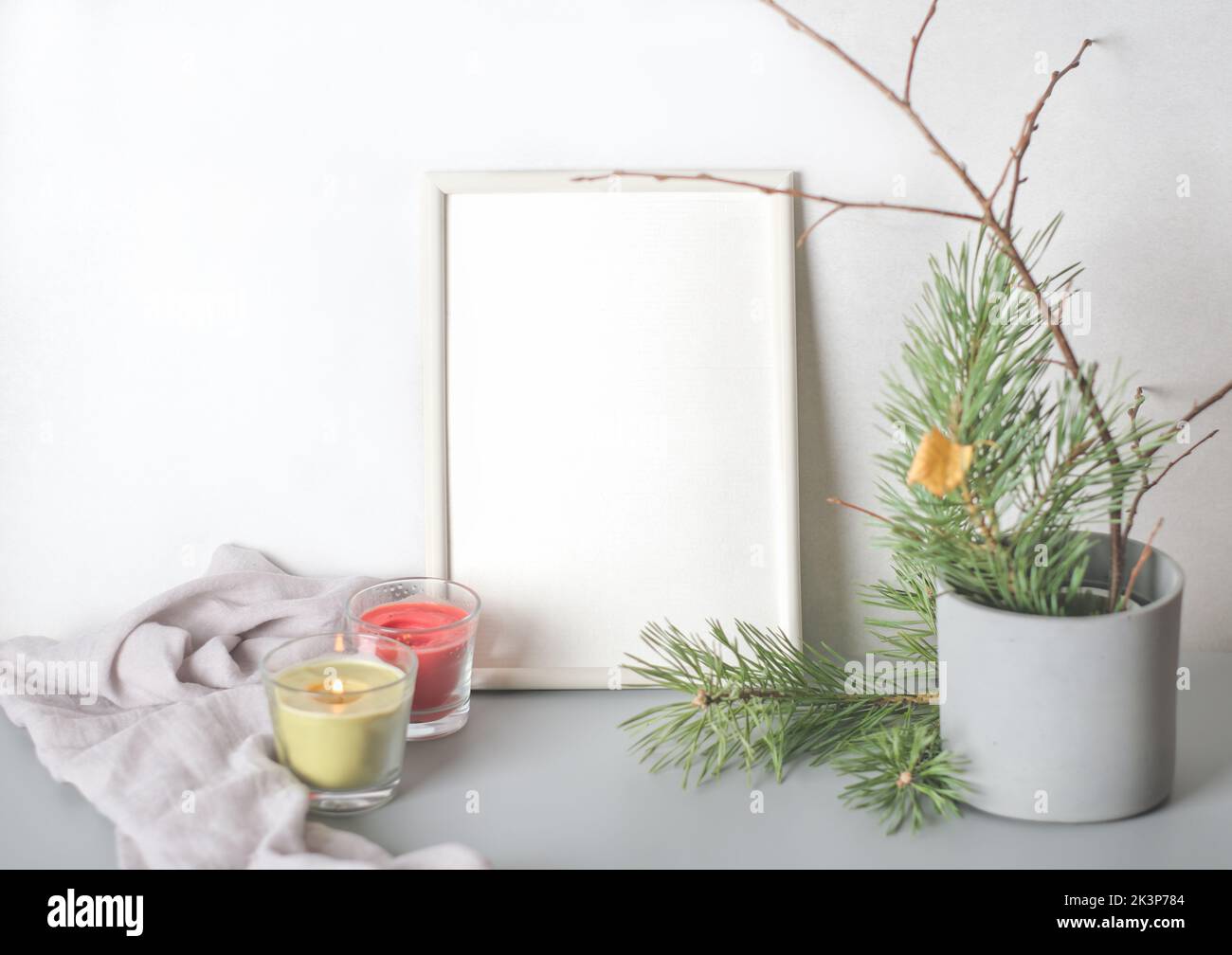 empty frame with copy space. winter still life with glowing candles and ...
