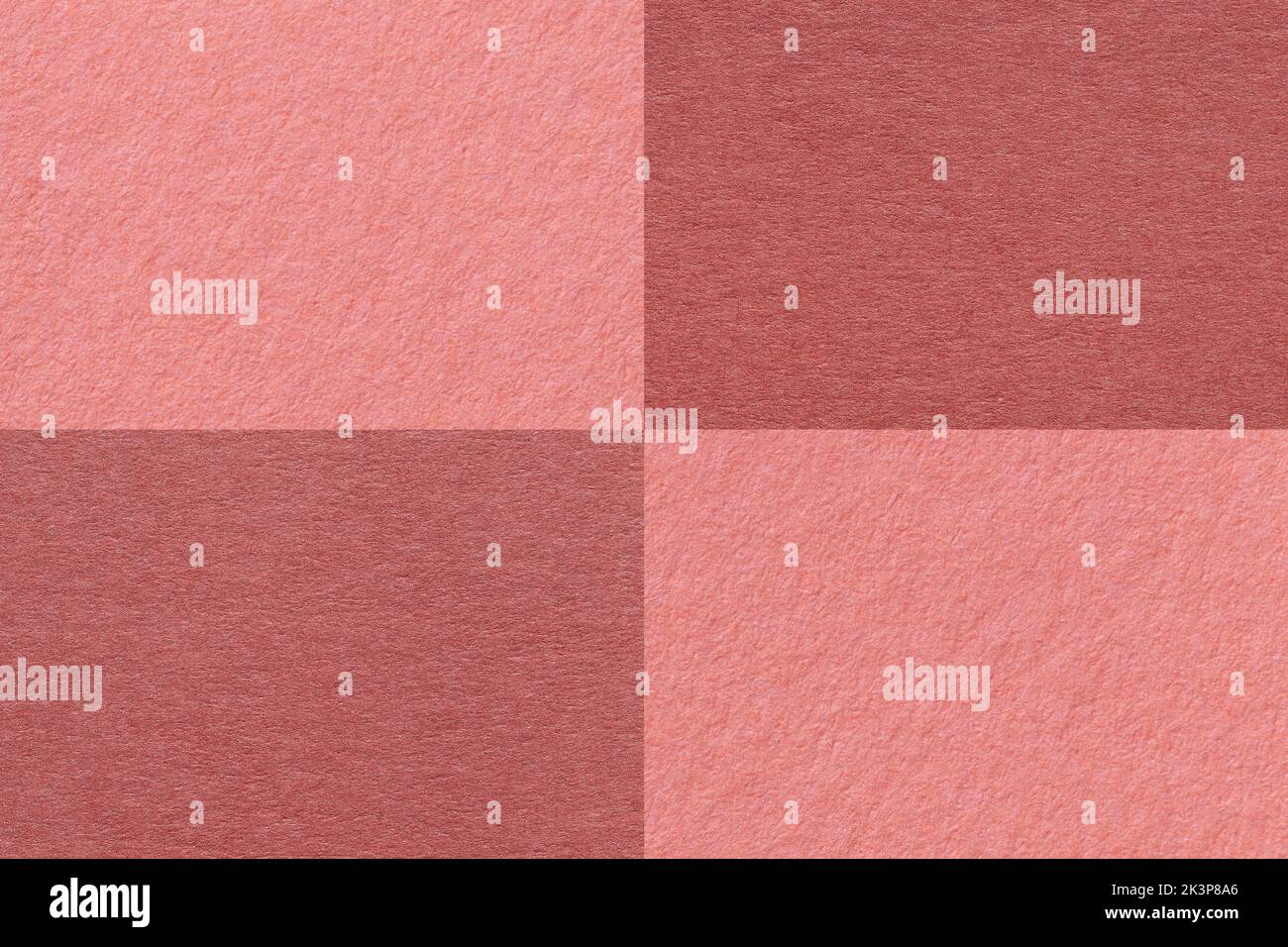 Texture of craft dark pink and maroon paper background with cells ...
