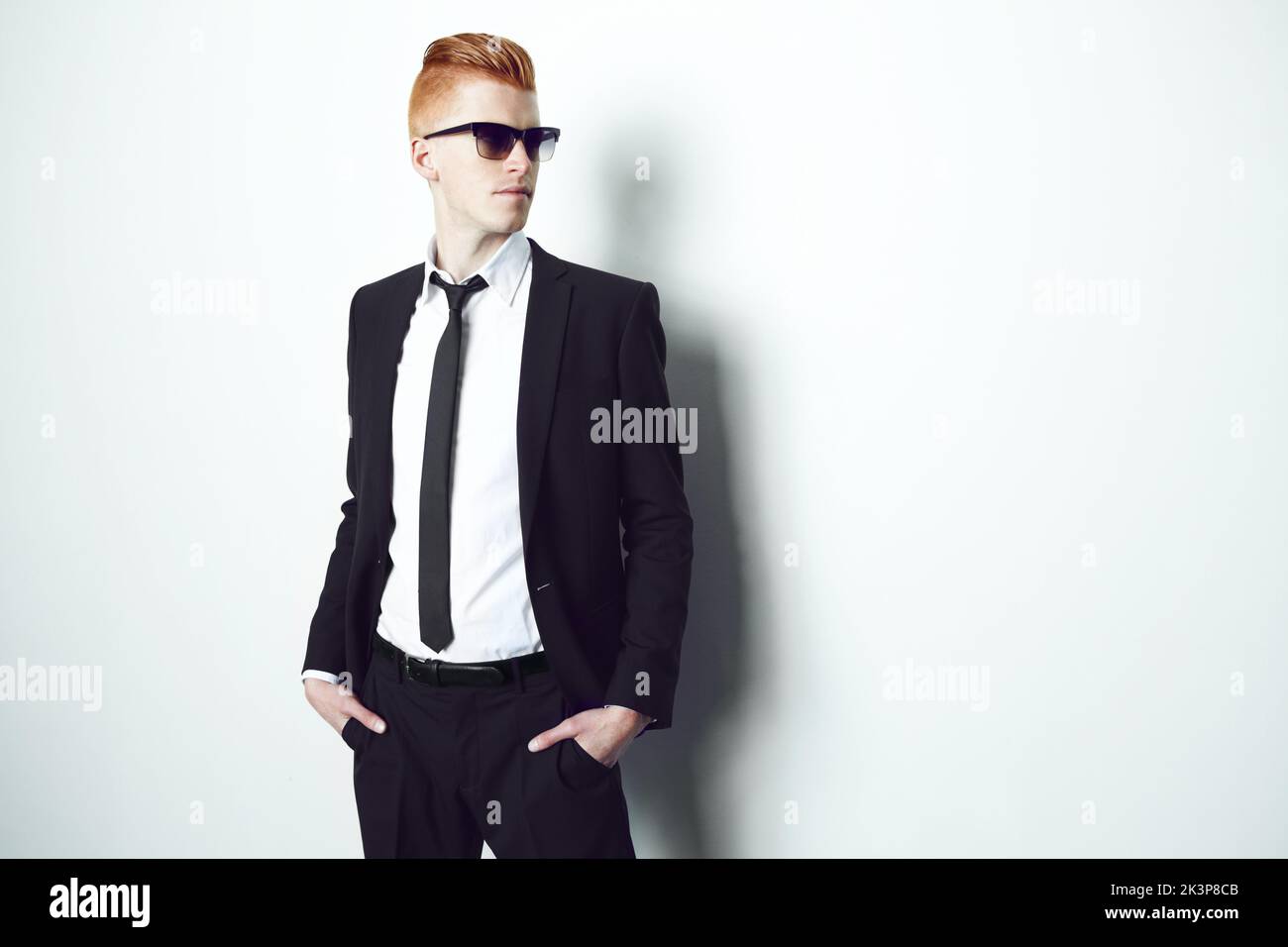 I take pride in my appearance. A red haired male in a suit and ...