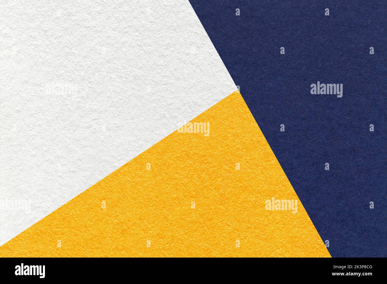 Texture of craft navy blue, white and golden shade color paper ...