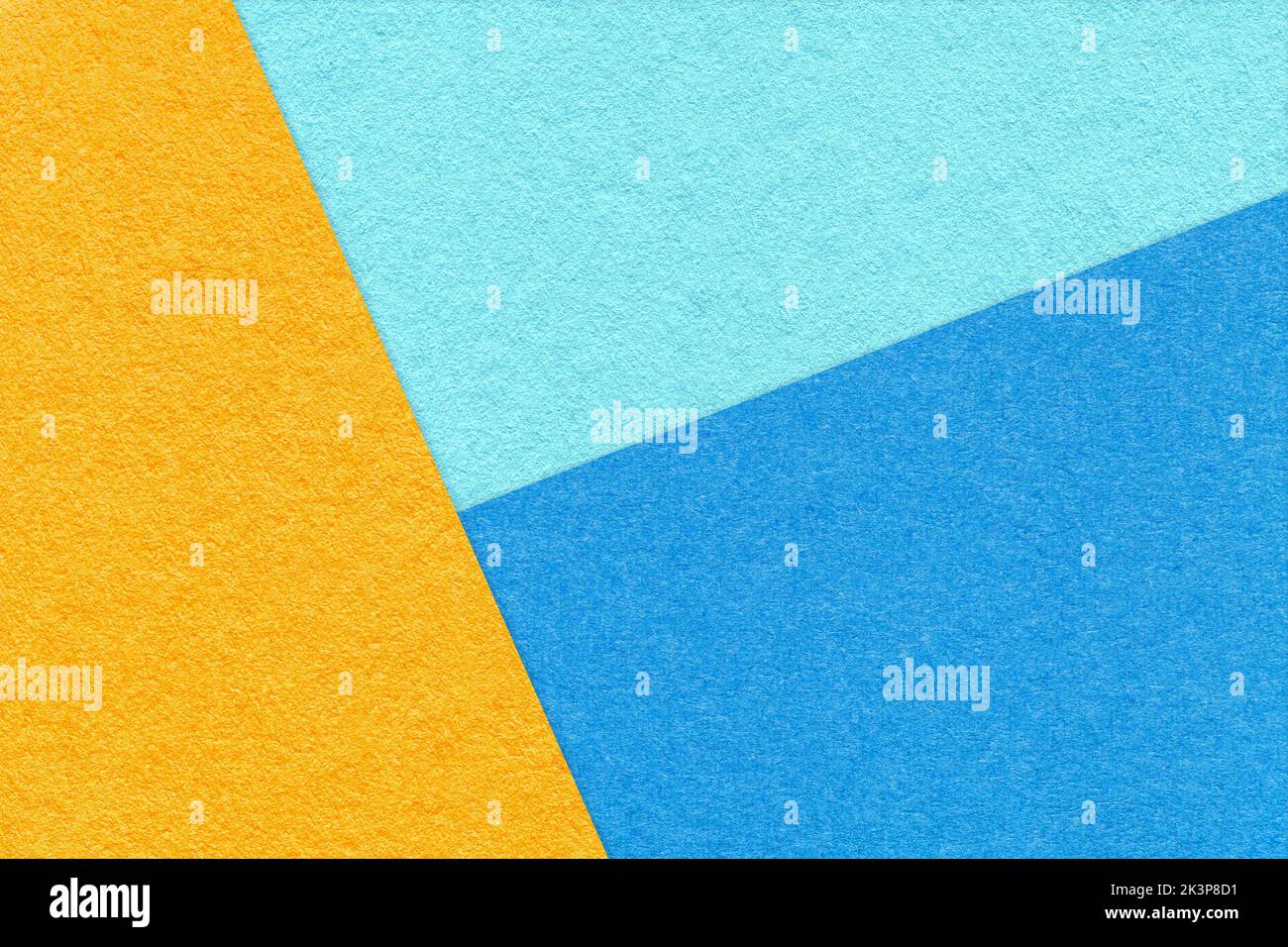 Texture of craft yellow, blue and cerulean shade color paper background ...