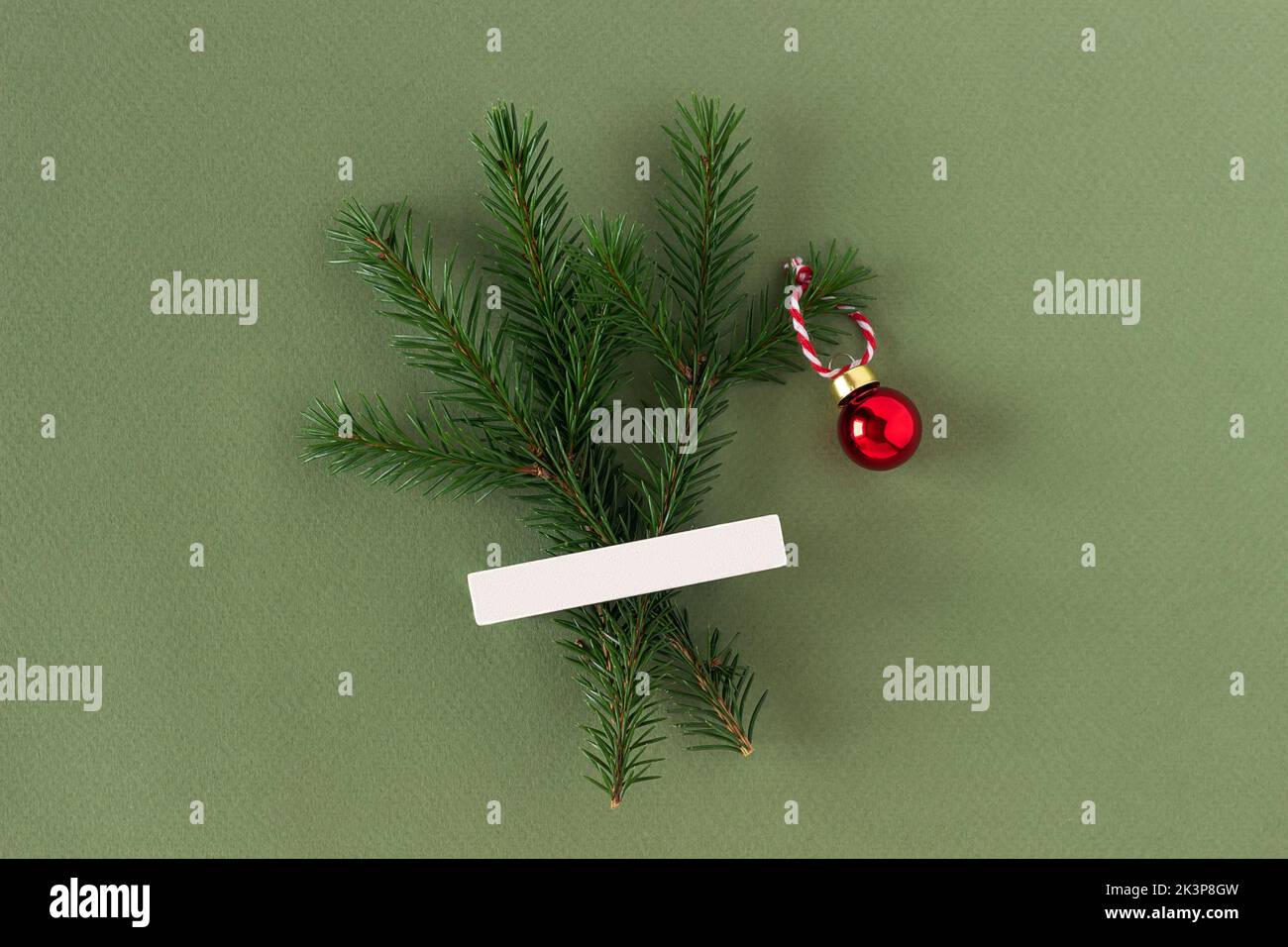 Winter holiday creative layout made of christmas tree on green ...