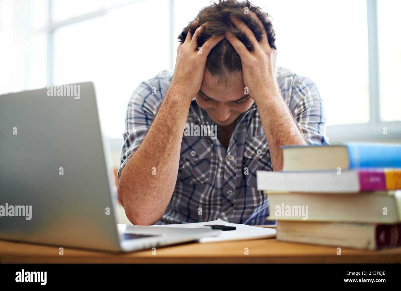 Student stress computer books hi-res stock photography and images - Alamy