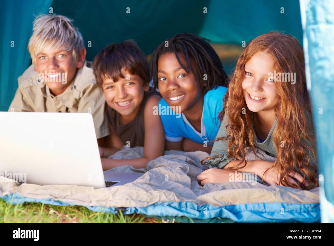 Online access no matter where we are. Children enjoying using a laptop ...