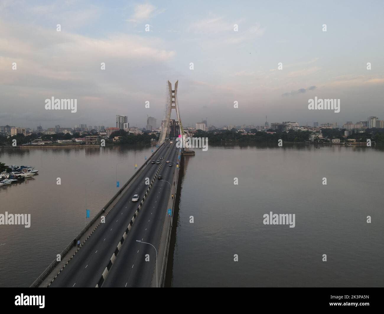 An aerial view of a highway bridge on a canal in Lagos, Nigeria at ...