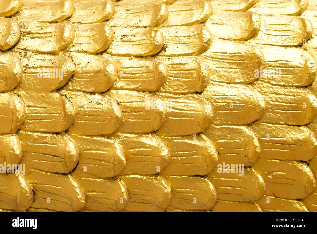 Golden scales close up surface Stock Photo - Alamy