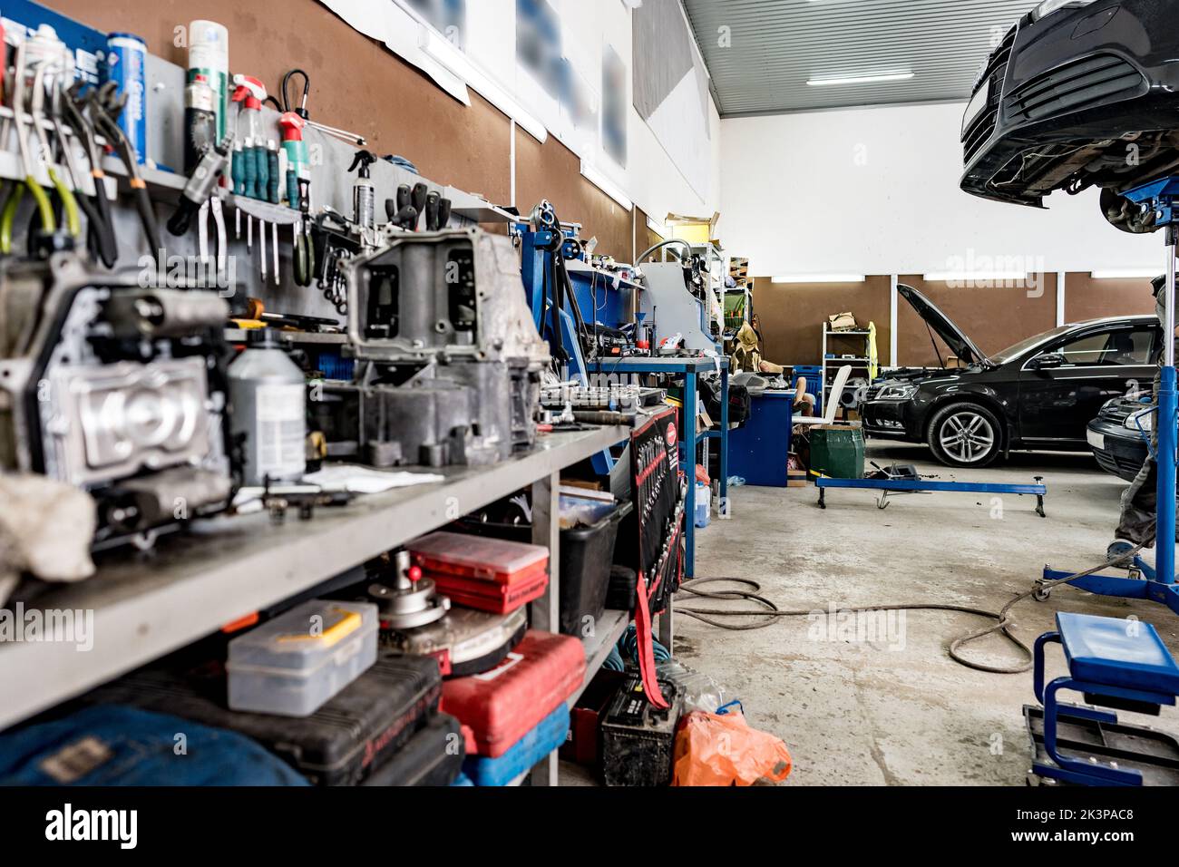 Large workbench with tools at station for vehicle technical servicing ...