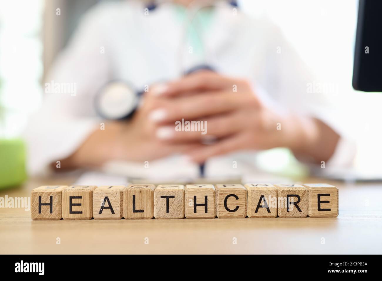 Doctor holding stethoscope information with medical and health care ...