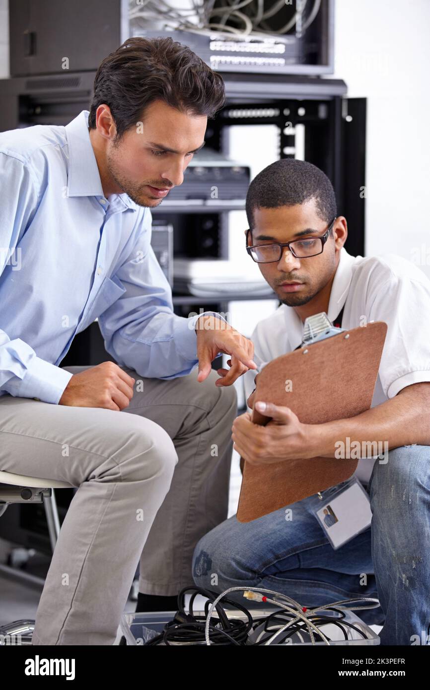 Helpful and reliable tech support. A young IT specialist ready to fix a ...