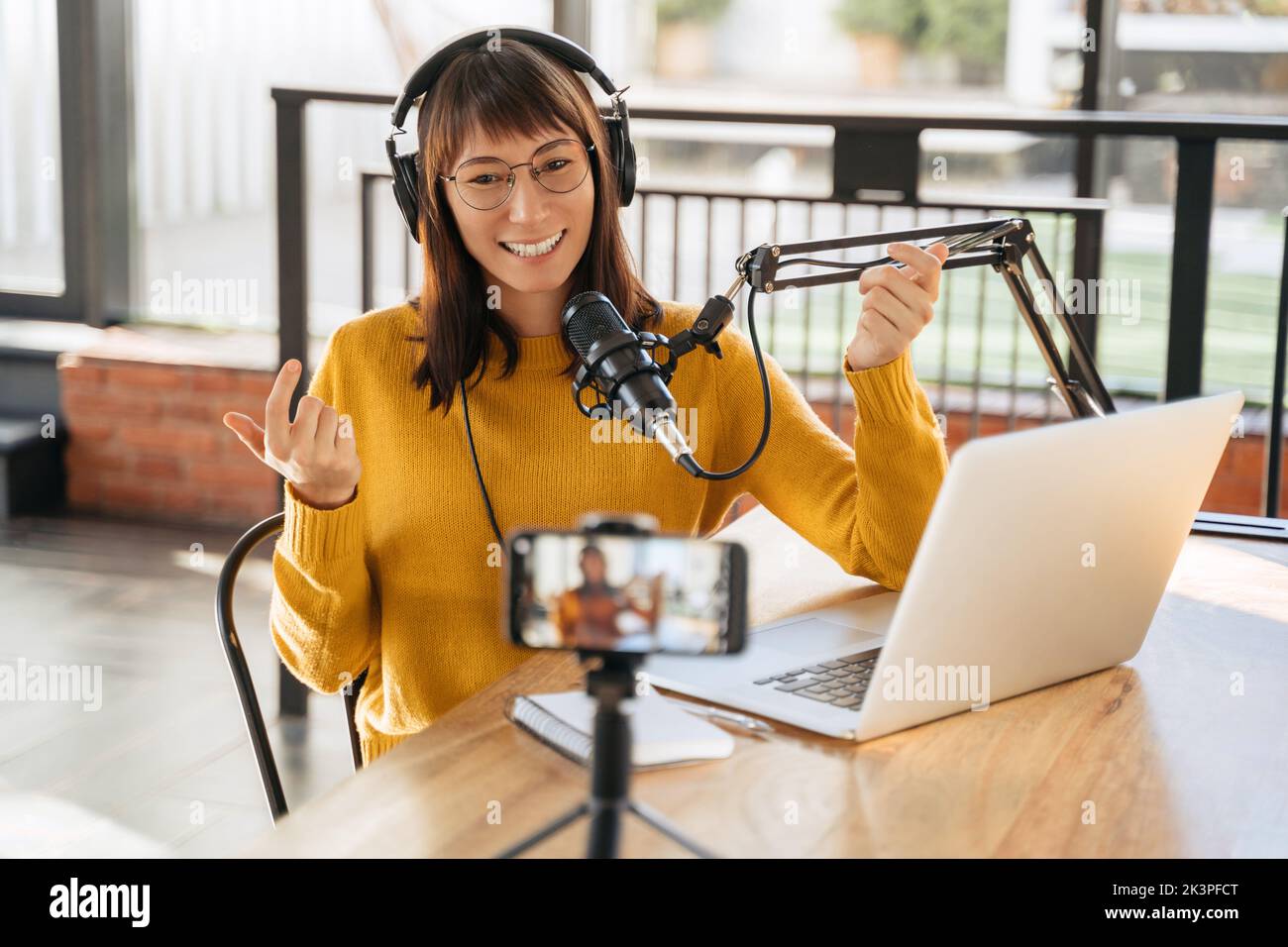 Woman recording video smartphone in hi-res stock photography and images ...