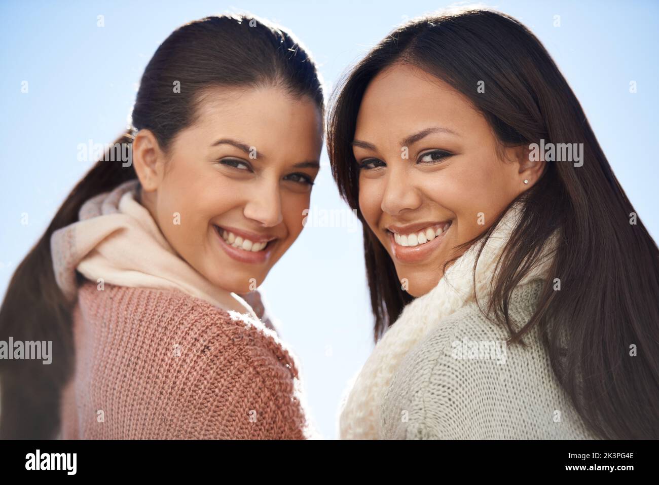 Our time together is never enough. Two young women smiling happily at ...
