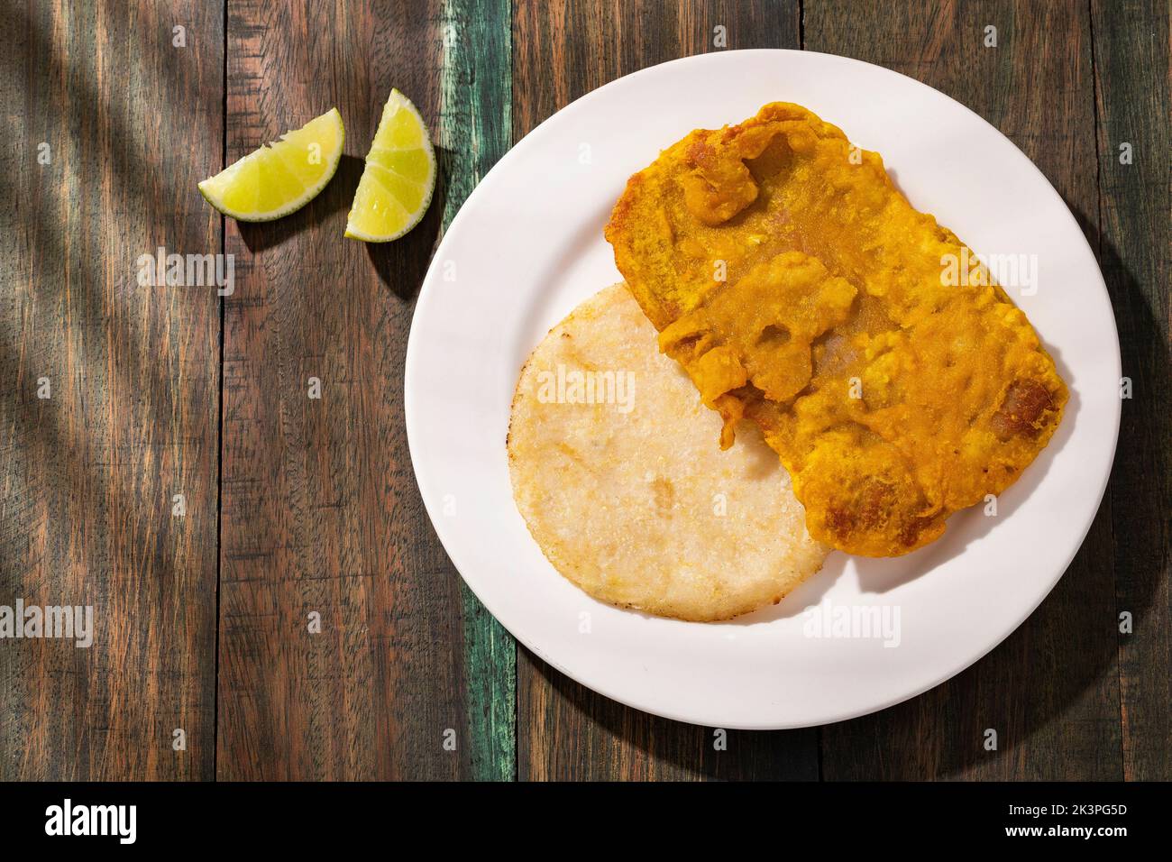 fried fish torta - Colombian street food Stock Photo - Alamy