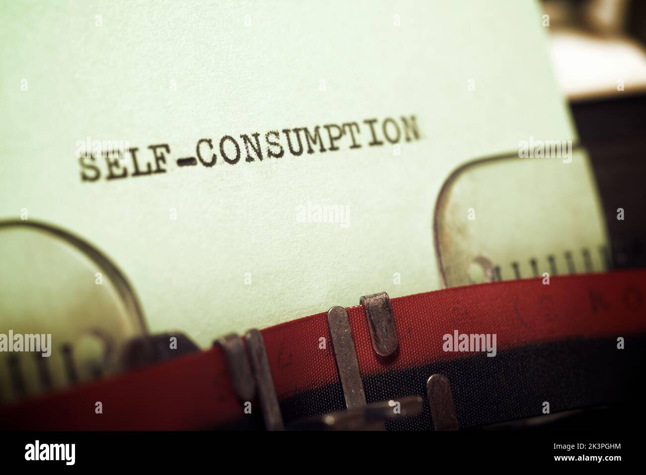 Self consumption text written with a typewriter Stock Photo - Alamy