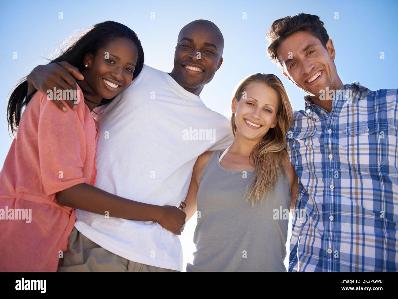 Spending time on the beach with great friends. Cropped portrait of two ...