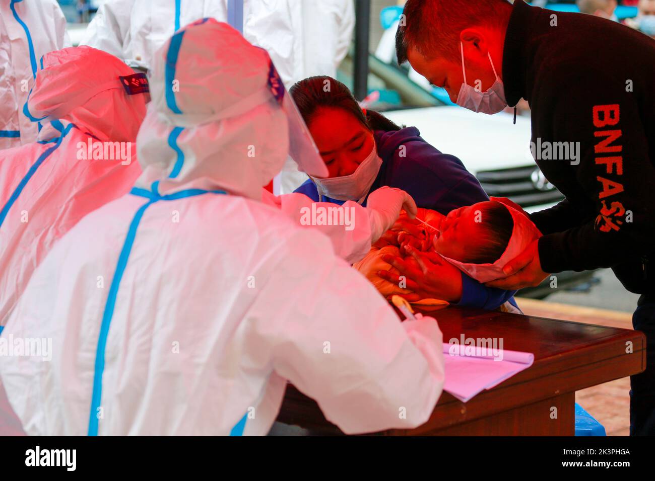 WEINING, CHINA - SEPTEMBER 28, 2022 - A baby gets nucleic acid tests in ...