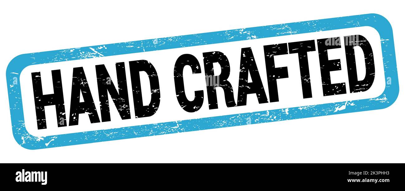 HAND CRAFTED text written on blue-black rectangle stamp sign Stock ...