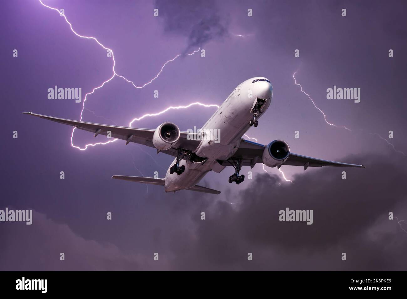 Landing airliner during a strong wind in a storm against the backdrop ...