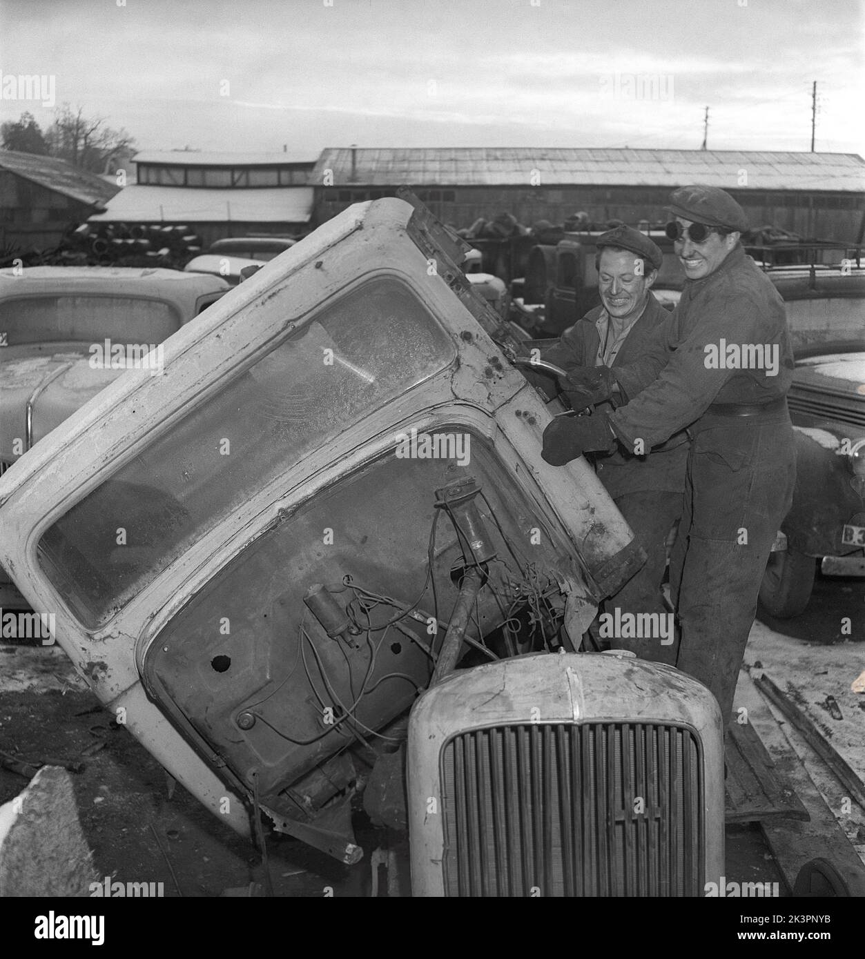 Man taking apart a vintage motor hi-res stock photography and images ...