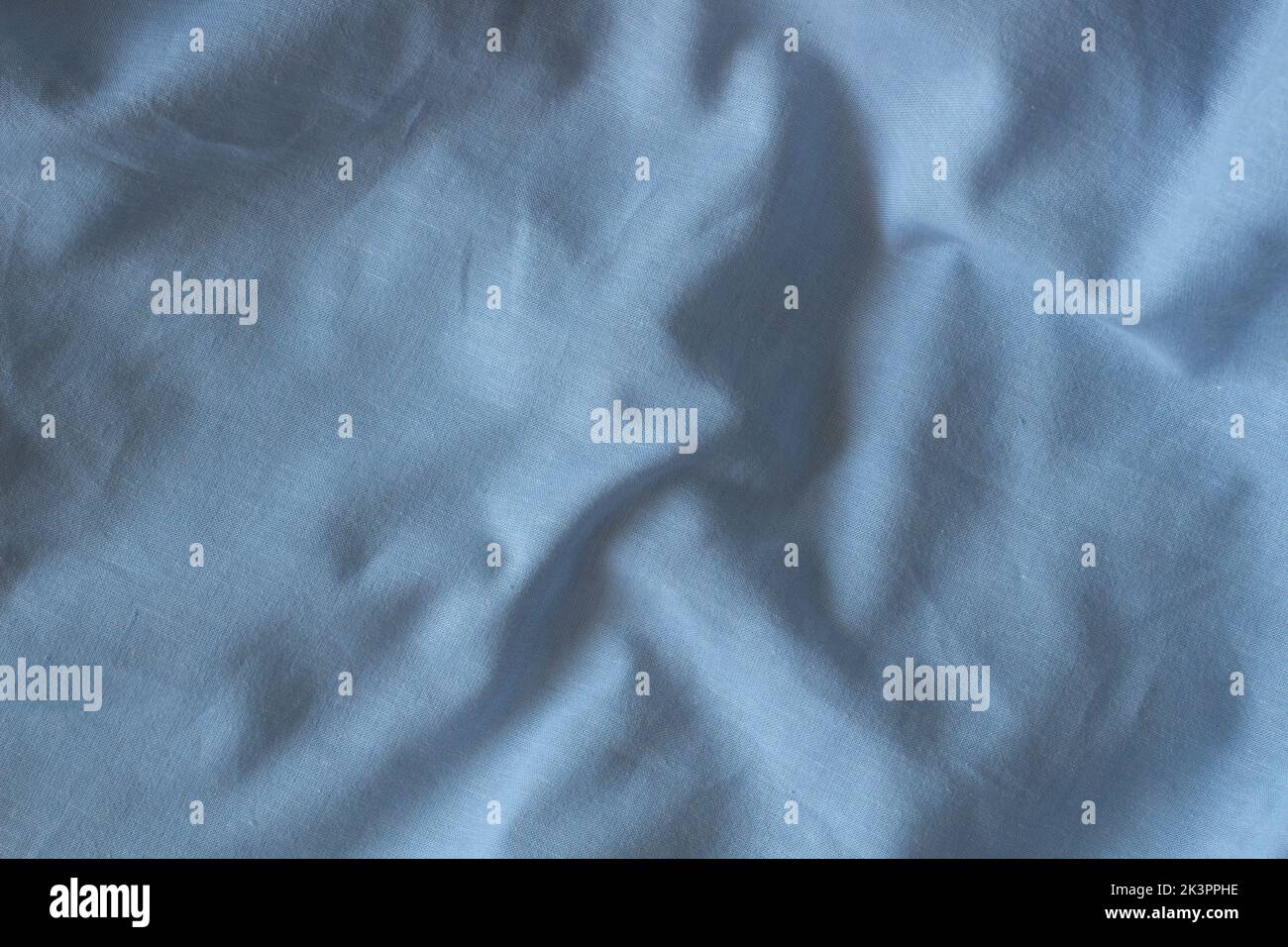 Abstract crumpled linen fabric texture background. Natural blue color ...