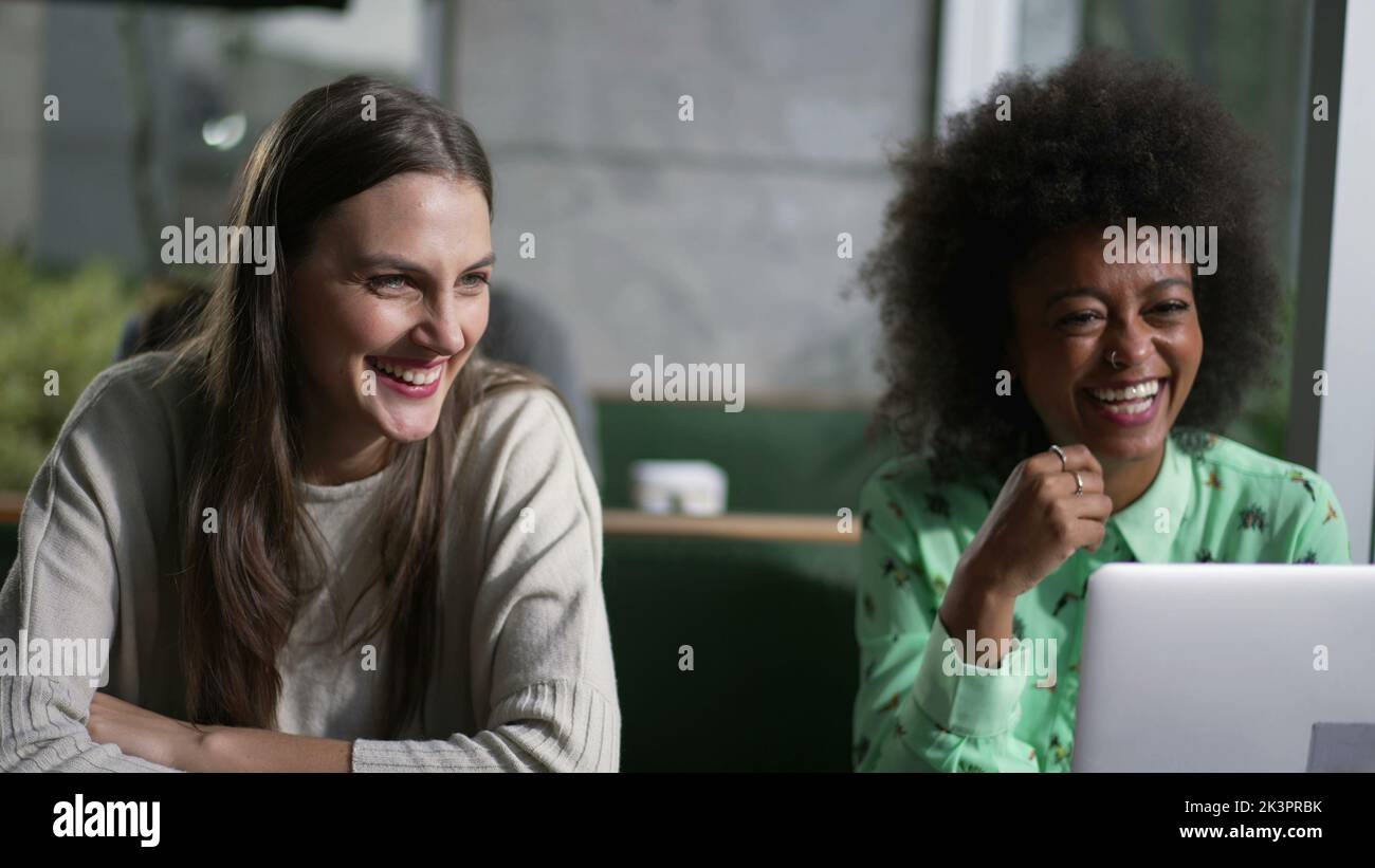 Diverse women at coffee shop in conversation. Three group of ...