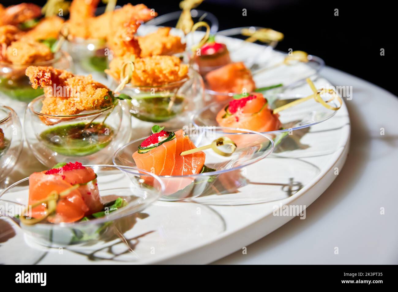 Set of various small appetizers on a buffet table Stock Photo - Alamy