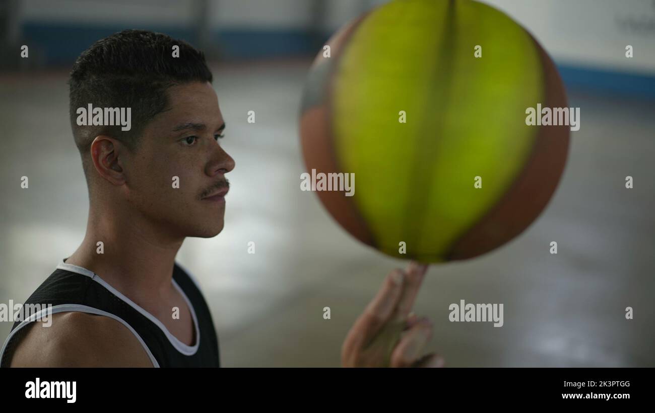 Disabled Athlete spinning basketball ball with finger. Handicapped ...