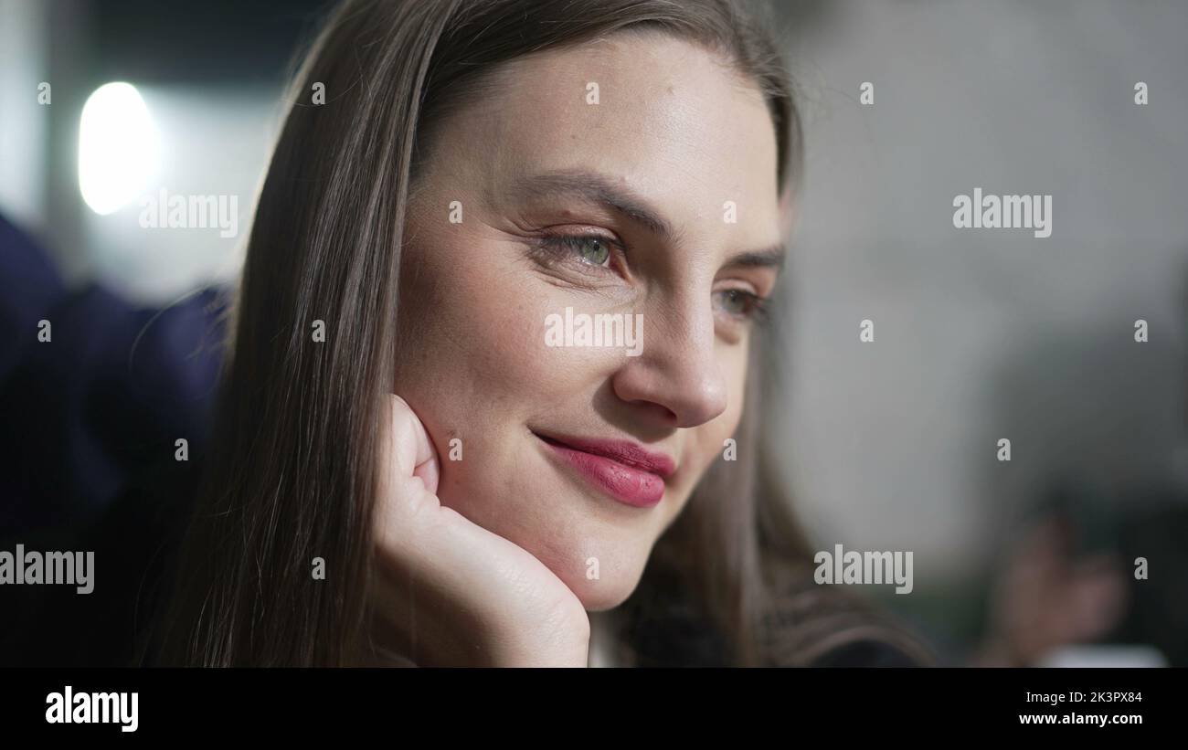 Happy contemplative young woman face. Pensive girl in 20s closeup ...
