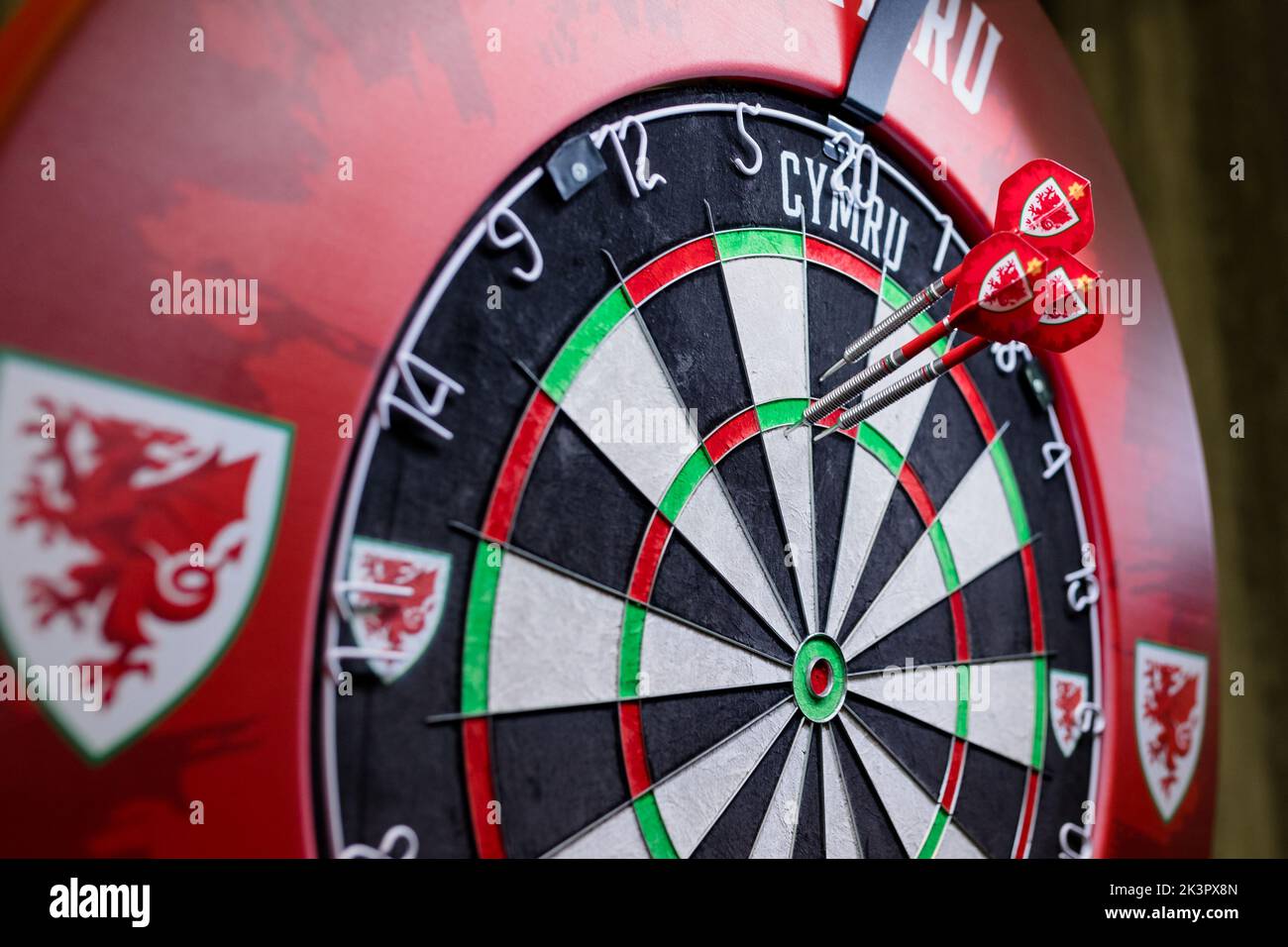 PONTYCLUN, WALES - 19 SEPTEMBER 2022: Wales dart board and darts for ...