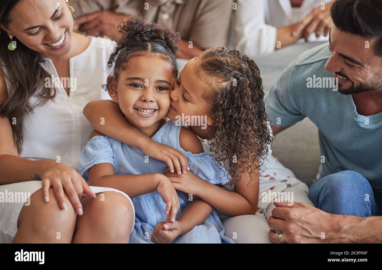 Sibling love, family and kiss with children sharing a special sister ...