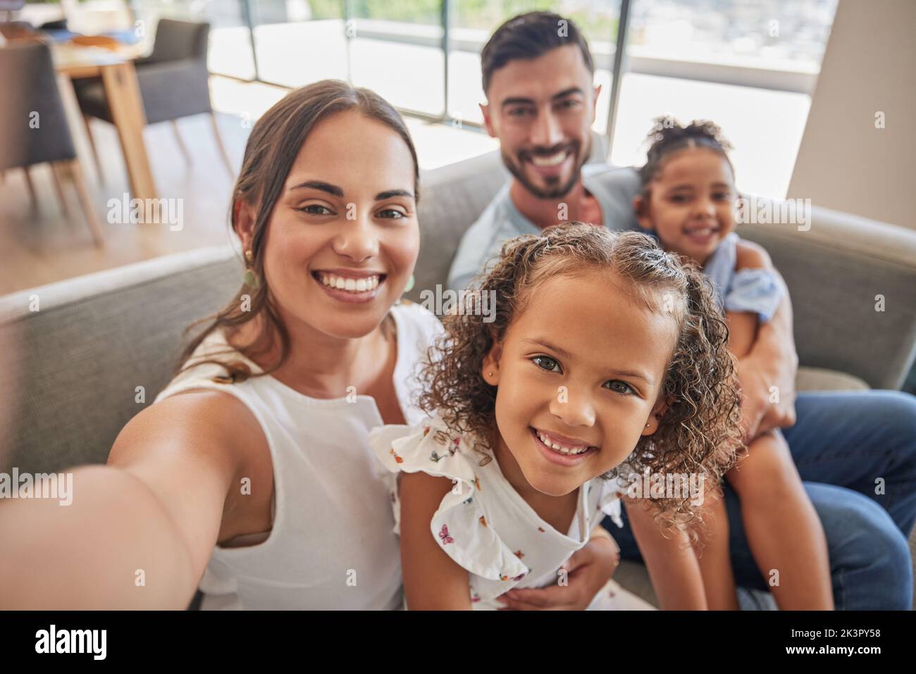 Happy family, selfie and love on sofa in home living room couch ...